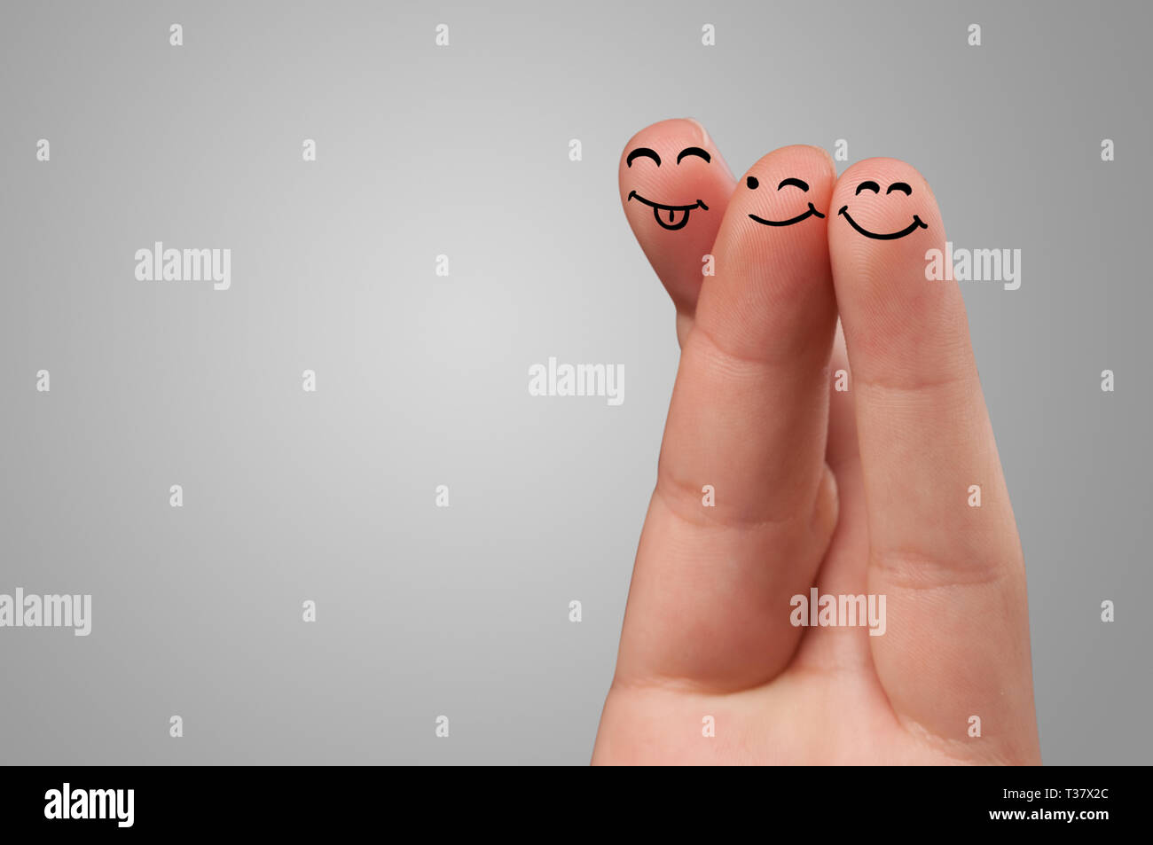 Happy face fingers hugs each other Stock Photo - Alamy