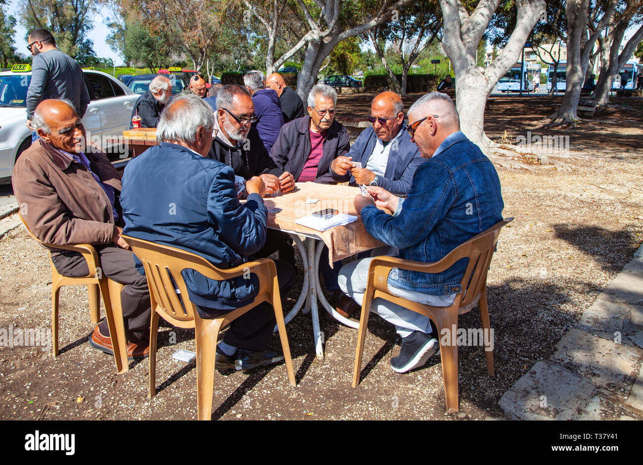 villagers playing card game in Paphos, Cyprus Stock Photo - Alamy