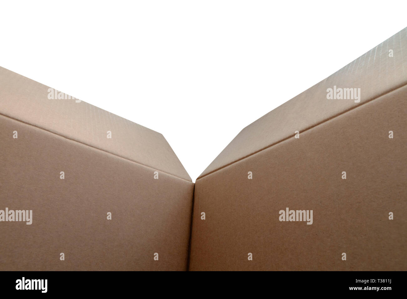 Inside of a cardboard box looking out to an isolated white background ...
