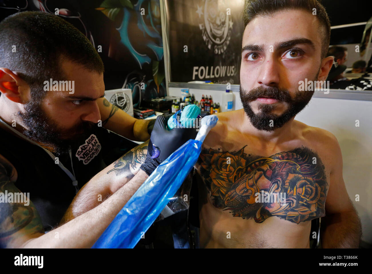 Beirut, Lebanon. 7th Apr, 2019. A man gets his arm tattooed during a ...