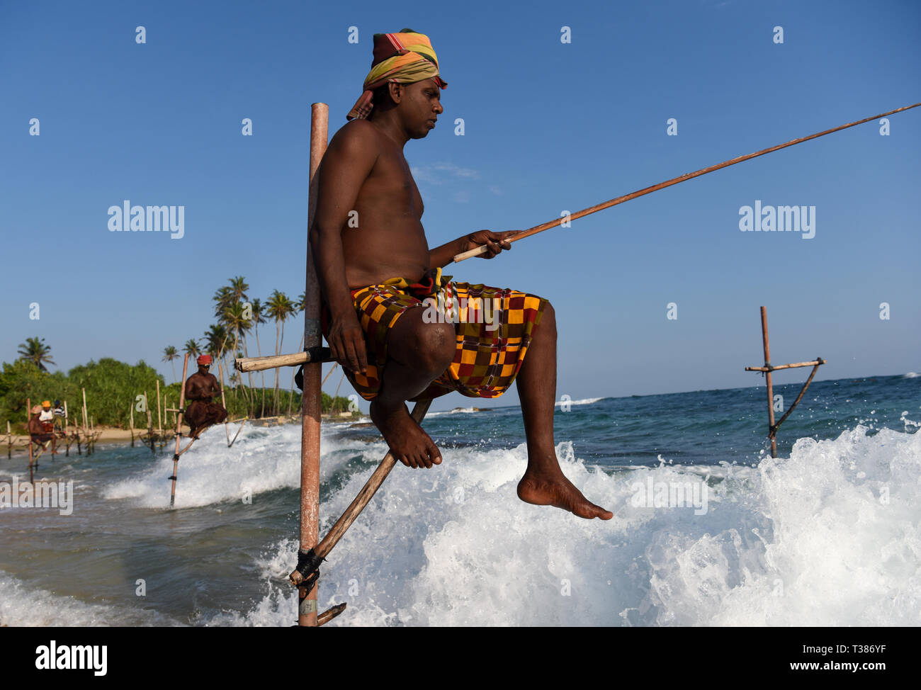 Colombo, Sri Lanka. 7th Apr, 2019. Stilt fishermen are seen at a beach ...