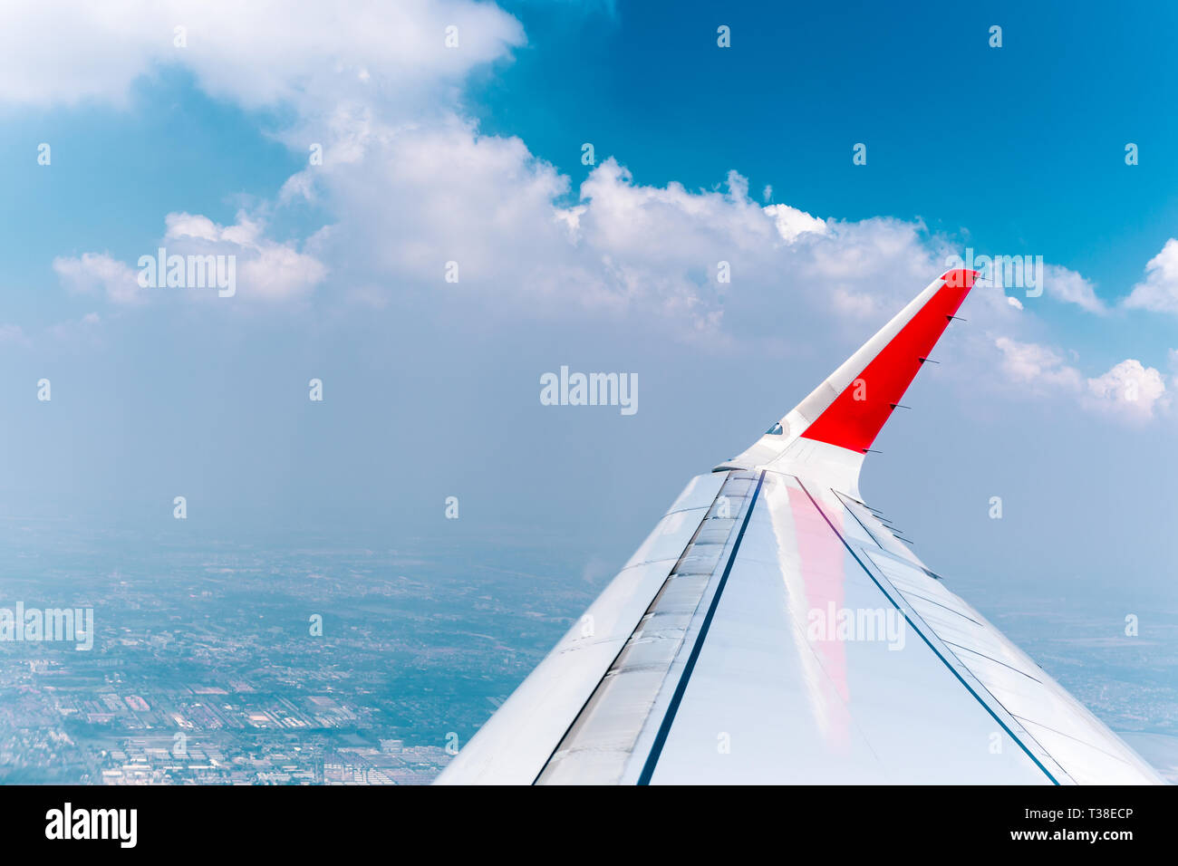 View through plane window with cloud and sky Stock Photo - Alamy