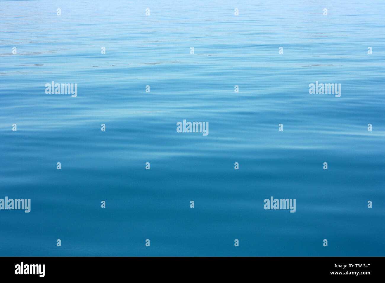 Abstract natural calm blue sea waves background Stock Photo - Alamy