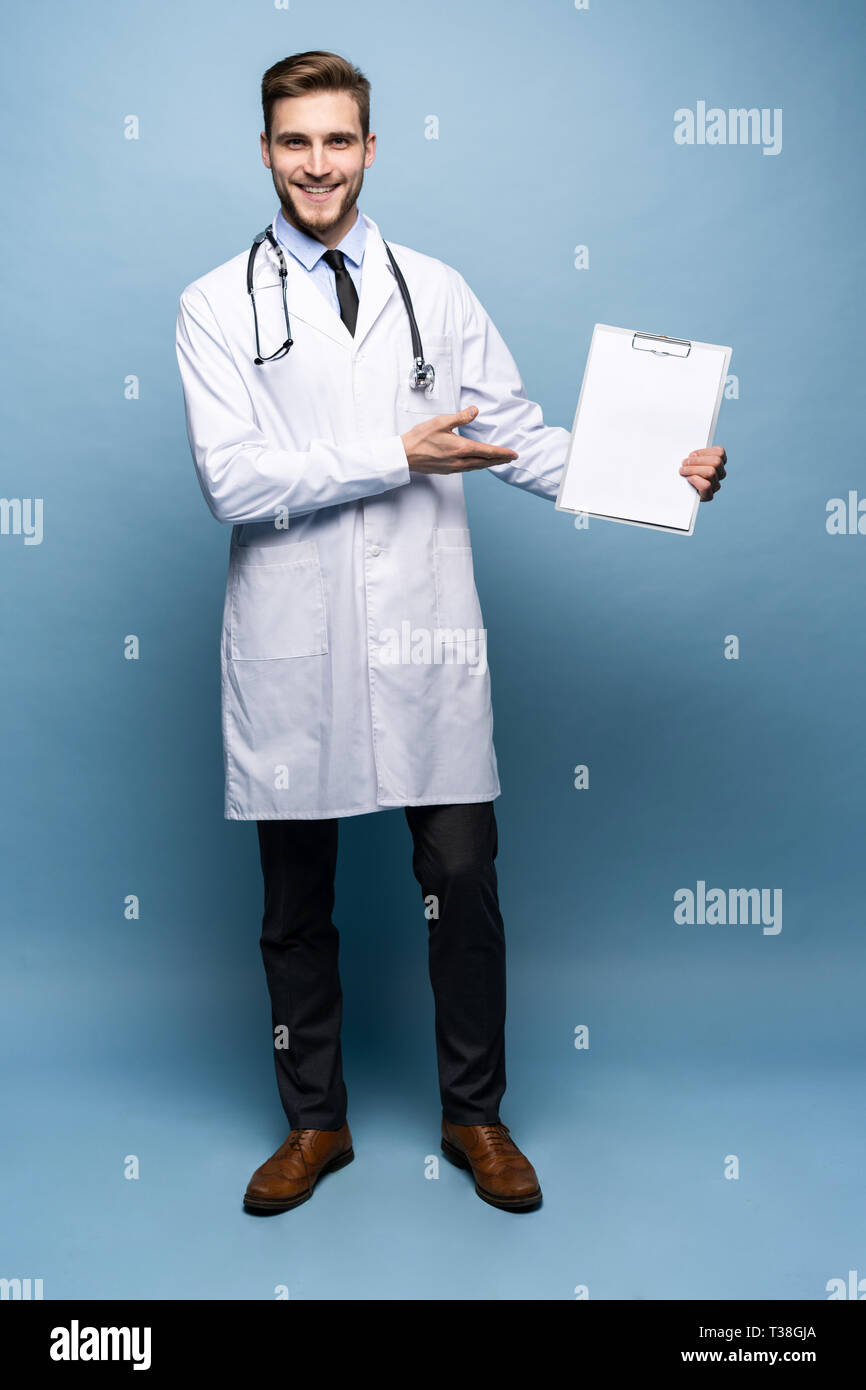 Male Doctor standing with folder, Doc is wearing white uniform and a ...