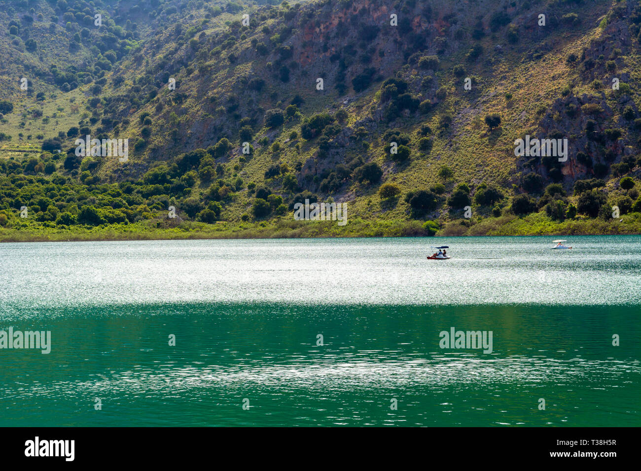 Lake Kournas, natural lake in Crete, surrounded by high mountains and ...