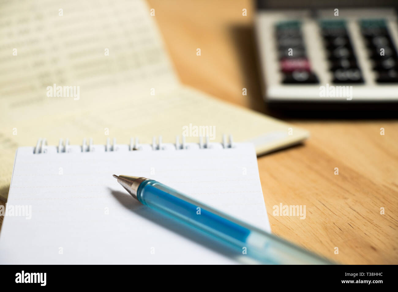 Calculator cheque book hi-res stock photography and images - Alamy