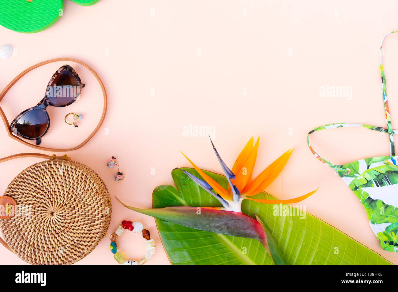 Summer flat lay scenery with beach accessories on pink background, top ...