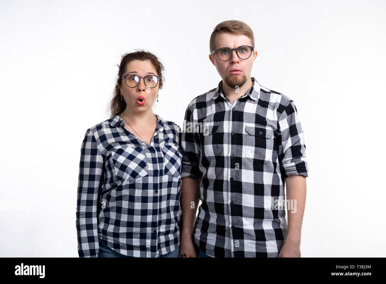 Nerds, bespectacled and funny people concept - funny couple in glasses ...
