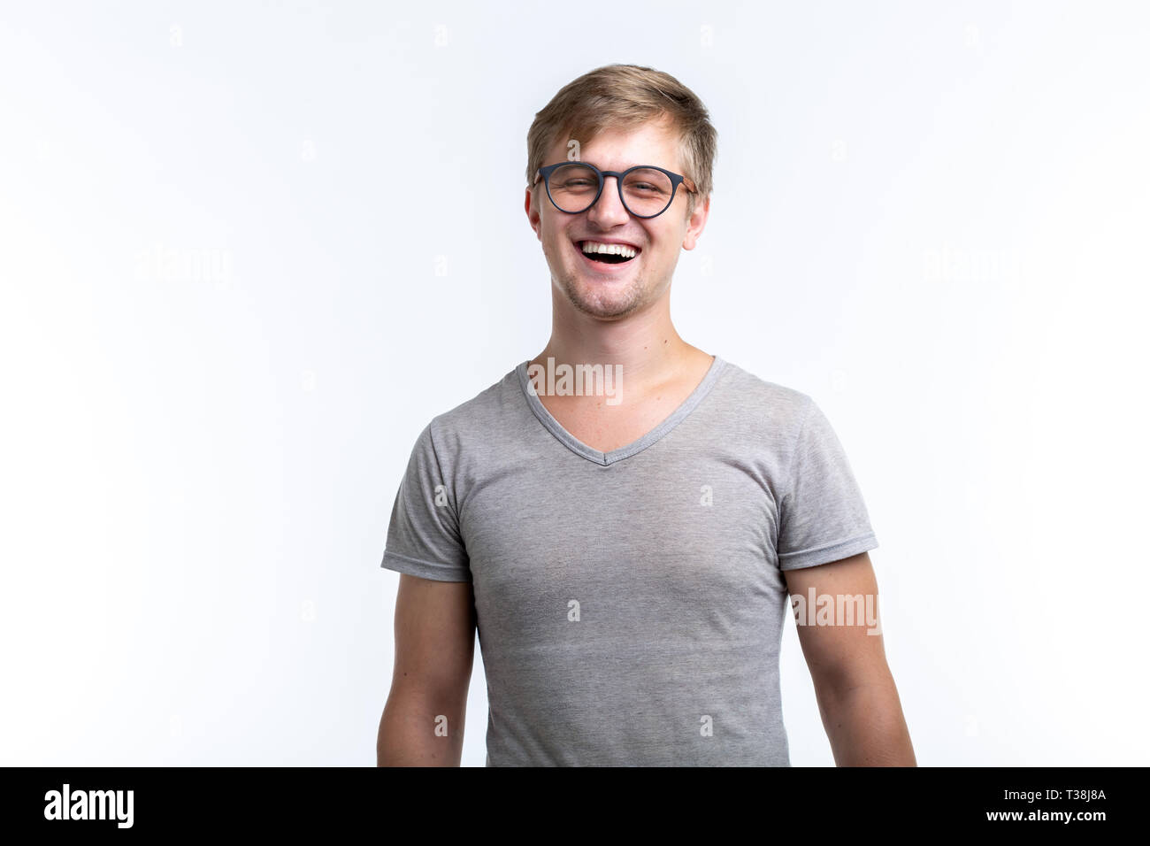 Geek, education, people concept - young man over the white background ...