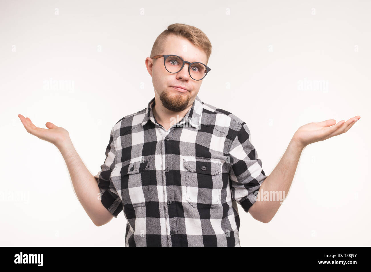 People, emotions and education concept - Student man gesturing shrug ...