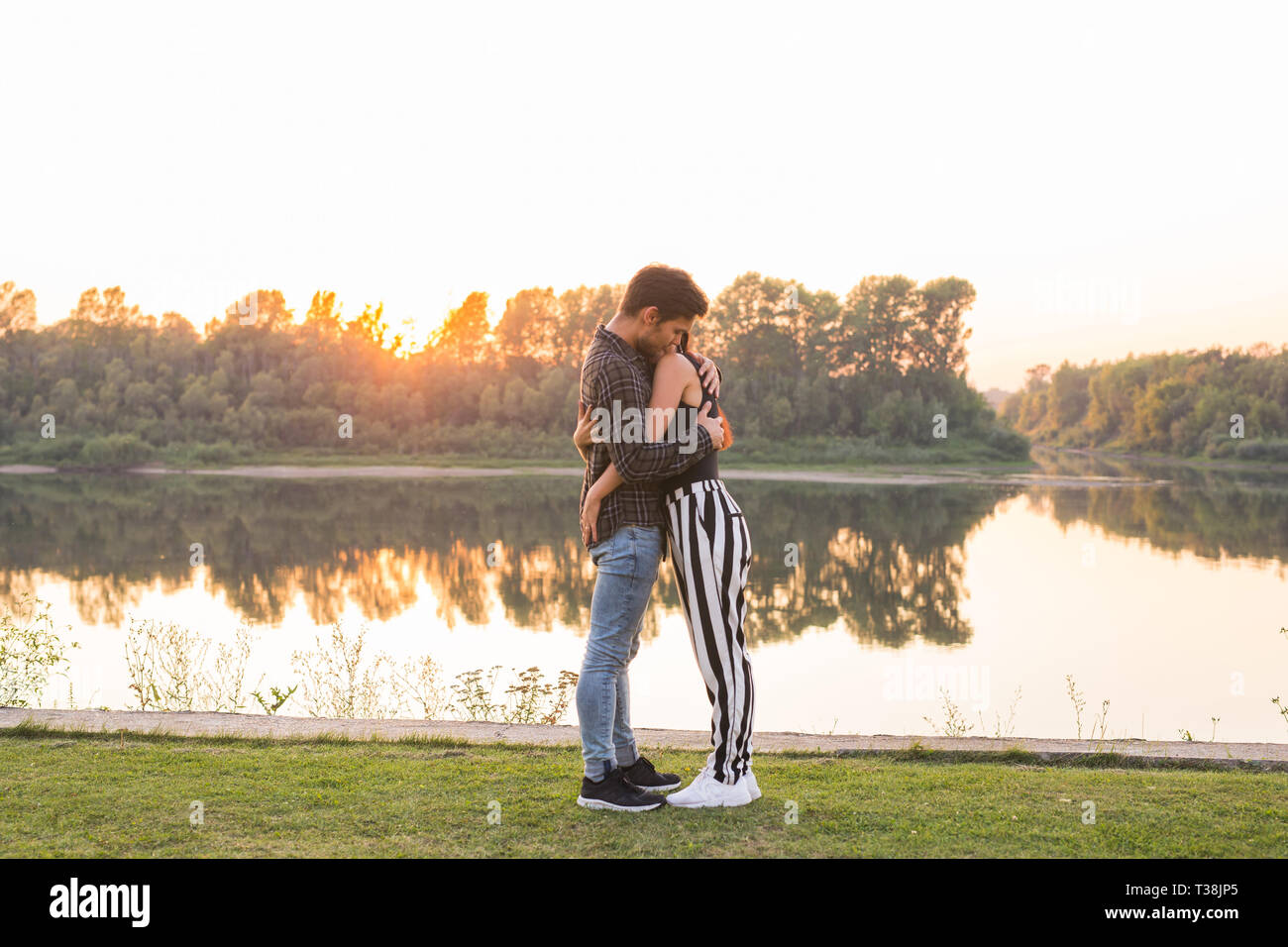Relationship, love and nature concept - Attractive woman and handsome ...