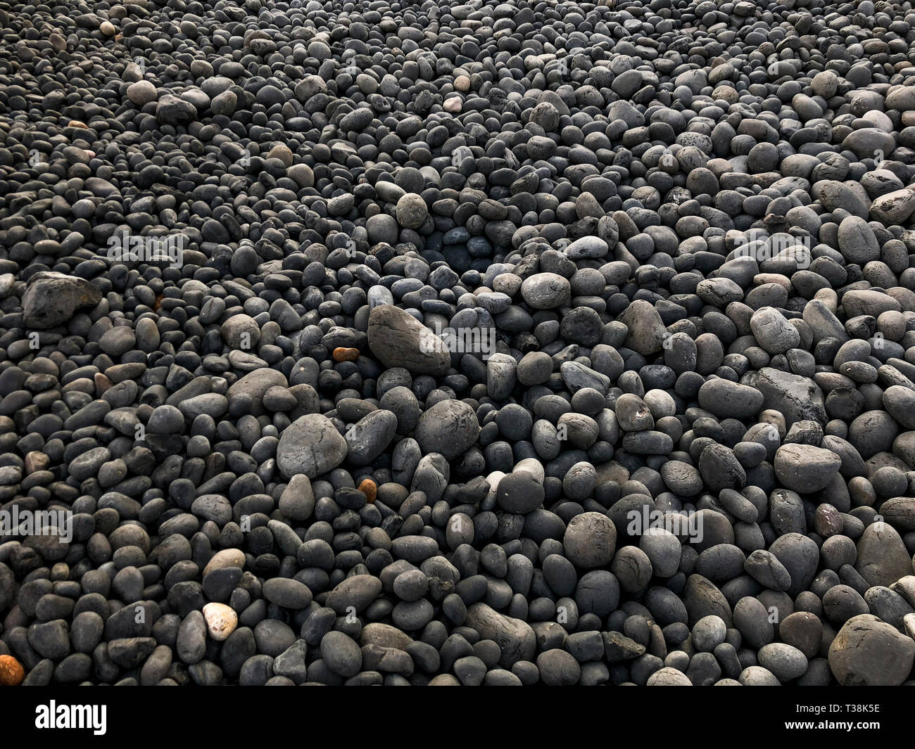 Volcanic stones of Mavra Volia Beach at Chios island Greece Stock Photo ...
