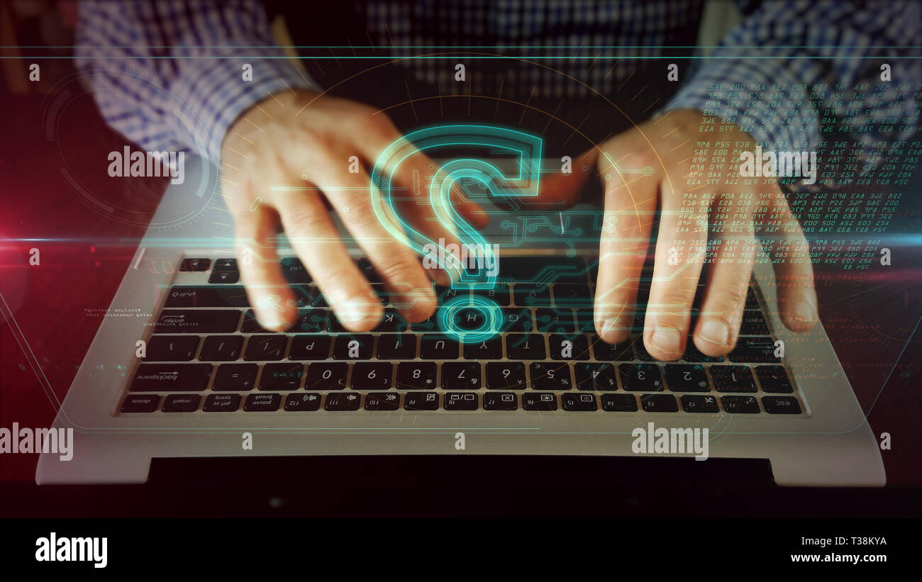 Man typing on laptop keyboard with question mark on hologram screen ...