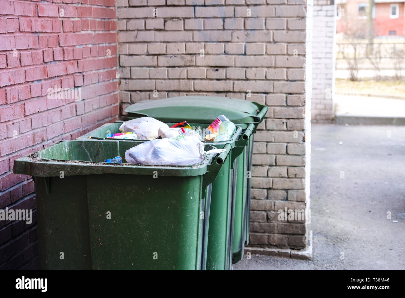 Garbage container. Filled to the brim. Environmental pollution ...