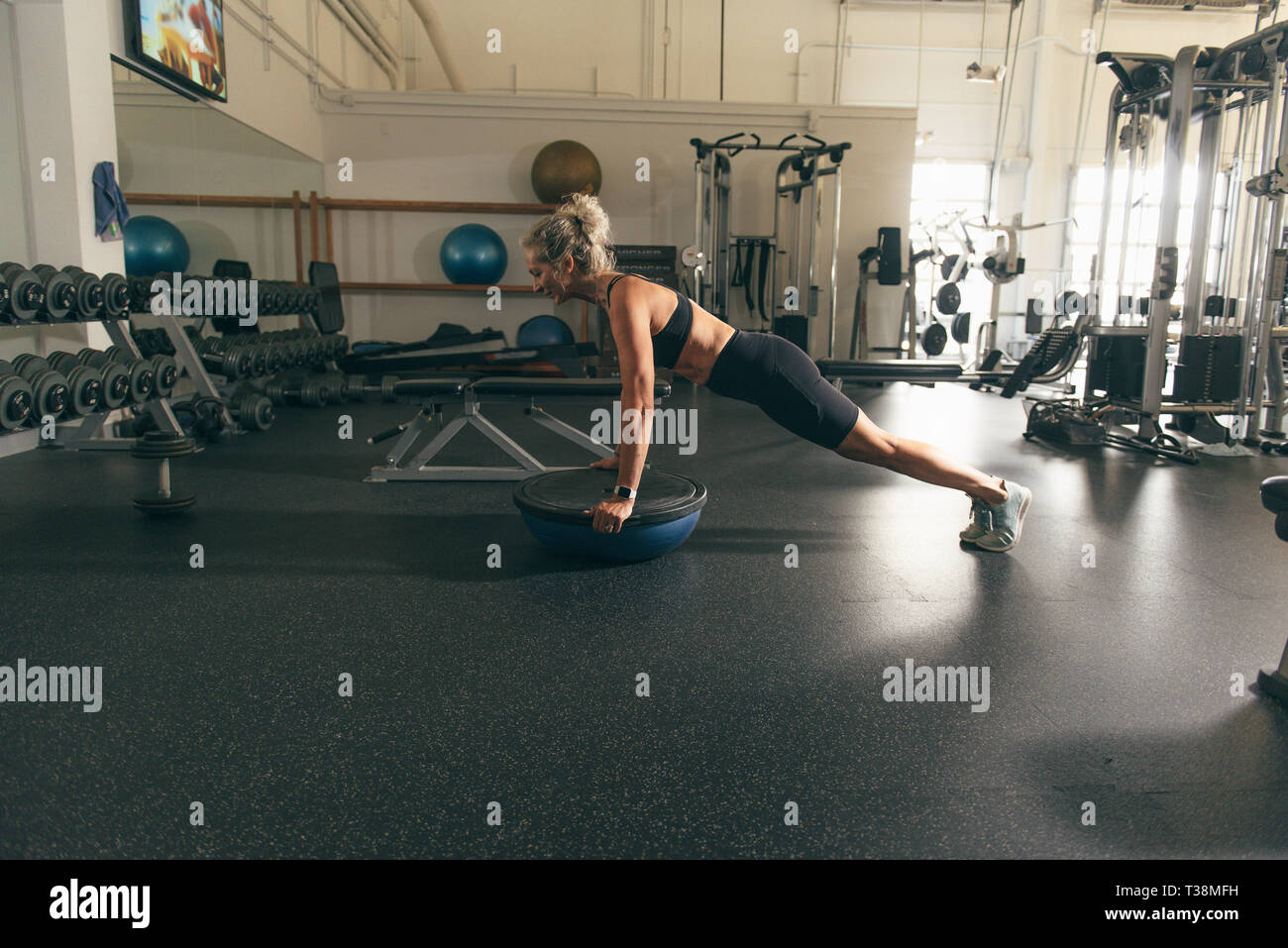 Female fitness model - gym Stock Photo - Alamy