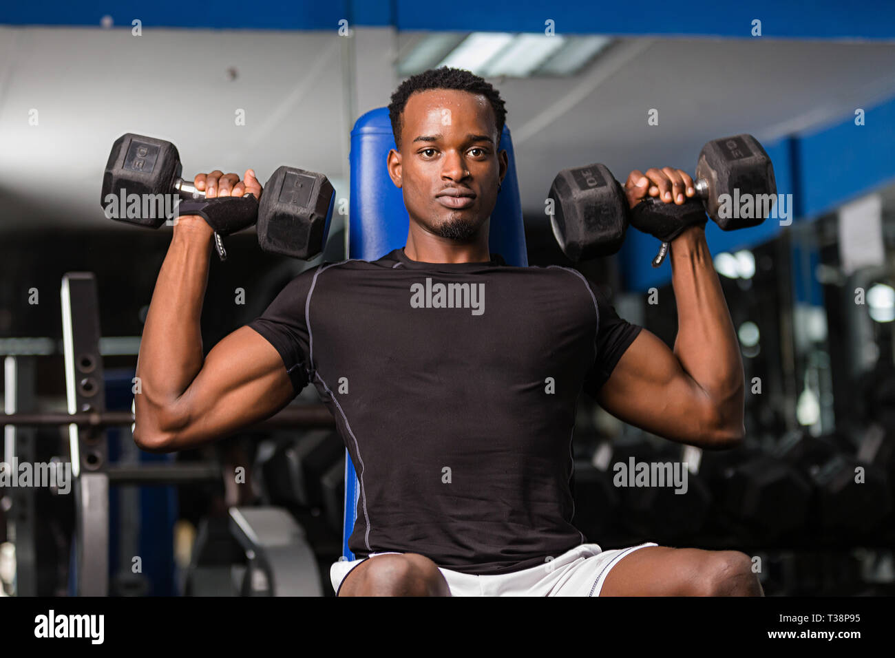 Black African American young man doing workout at the gym Stock Photo ...