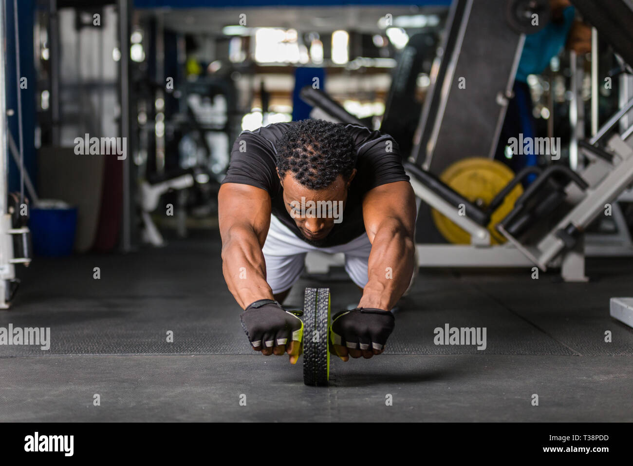 Black African American young man doing workout at the gym Stock Photo ...