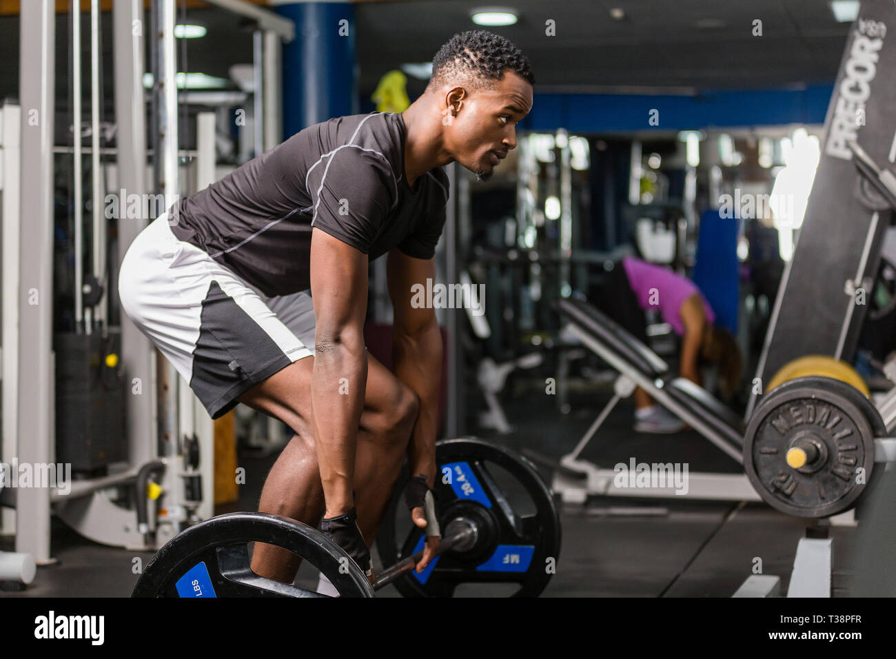 Black African American young man doing workout at the gym Stock Photo ...