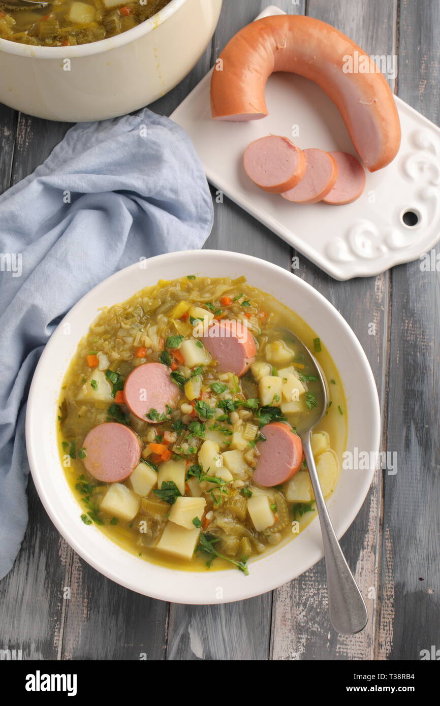Dutch Split Pea Soup, Erwtensoep on a rustic table Stock Photo - Alamy