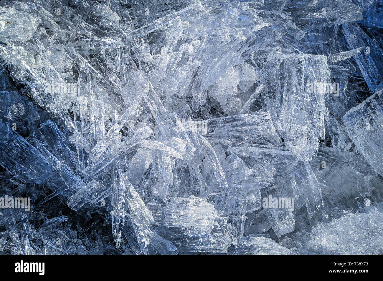 Frozen natural translucent glowing glacier crystals, macrostructure of ...