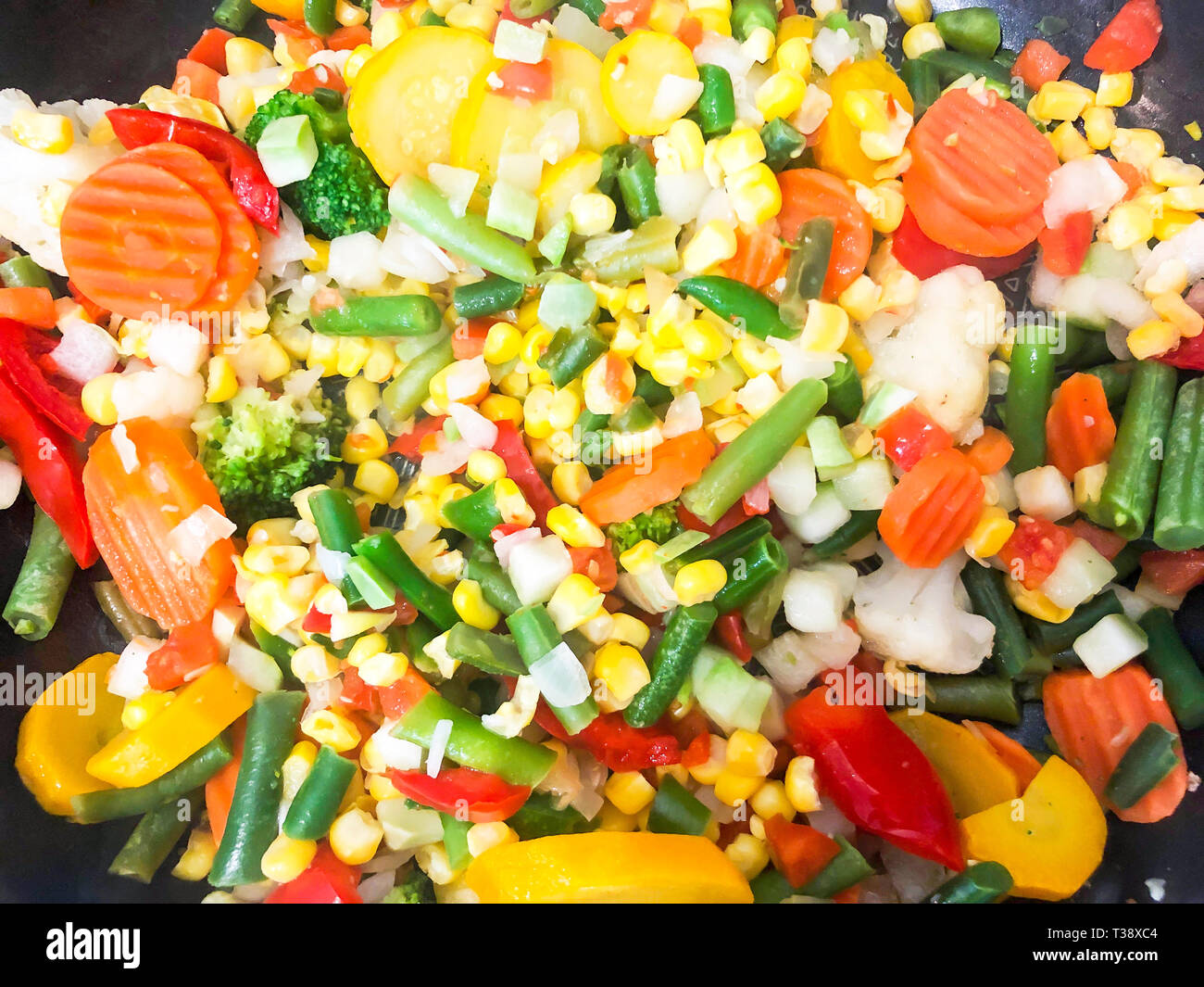 Bright tasty vegetable mix with corn. Studio Photo Stock Photo - Alamy