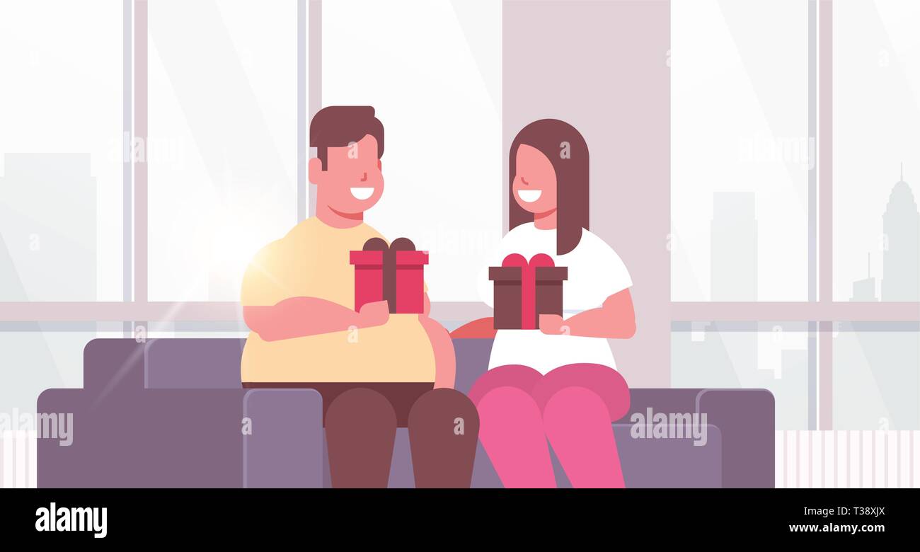 fat obese couple holding wrapped gift boxes holiday celebration concept ...