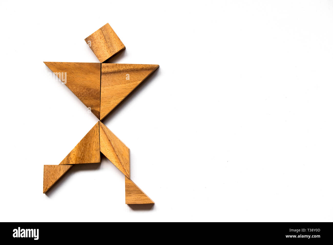 Wooden tangram as happy man shape on white background (Concept as ...