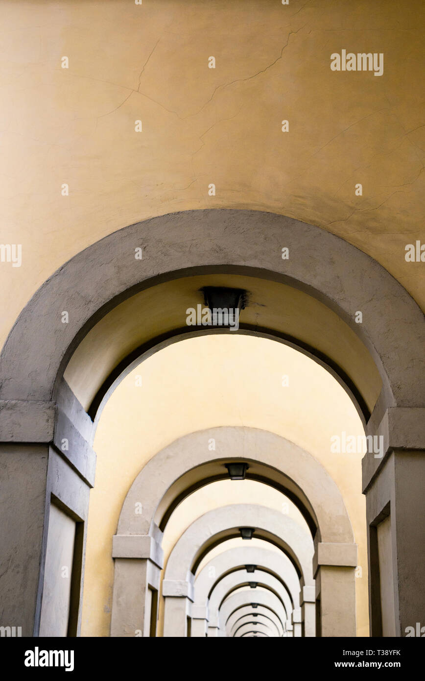 Arched medieval walkway of the Vassari Corridor in Florence, Italy ...