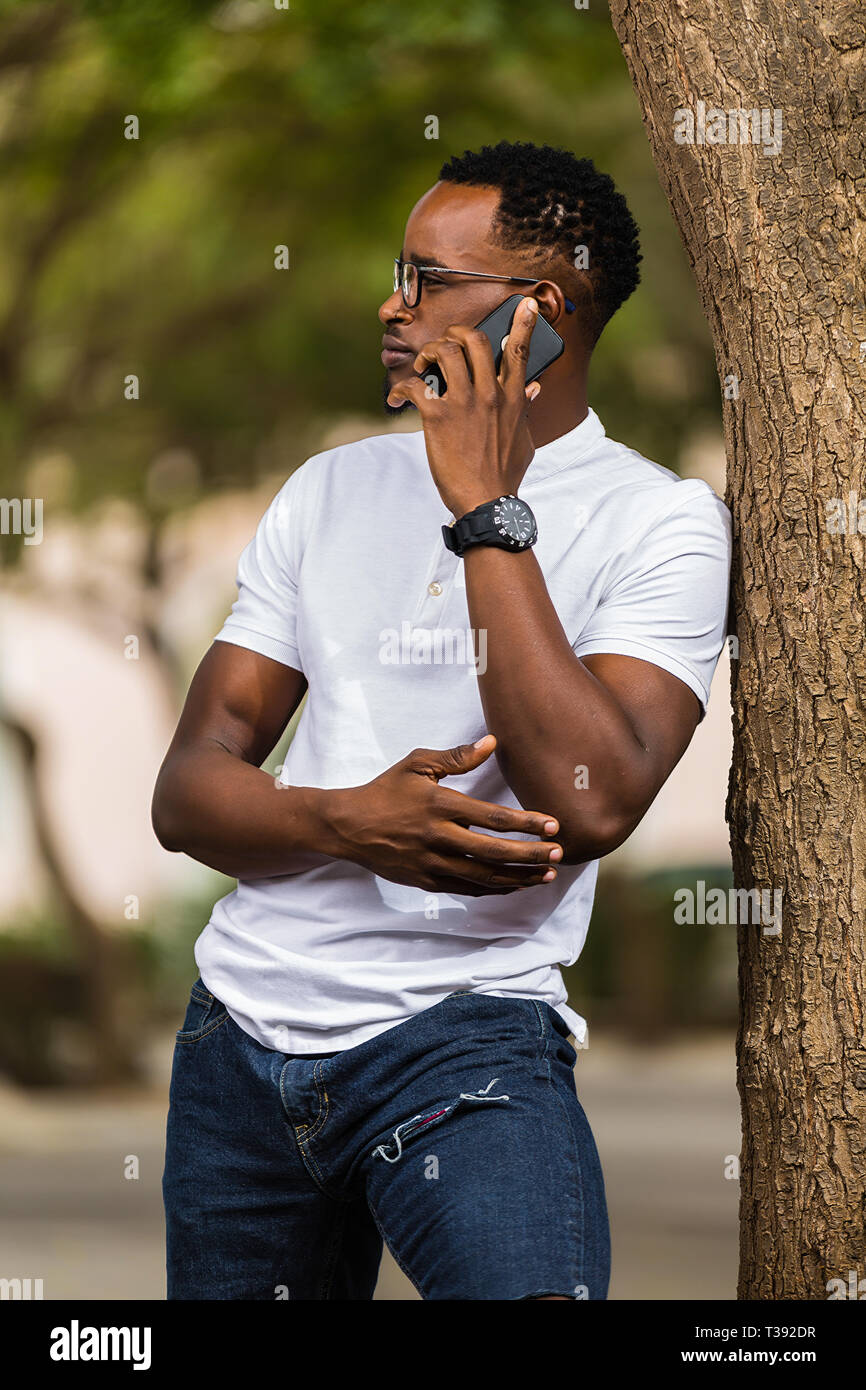 Black men talking outside hi-res stock photography and images - Alamy