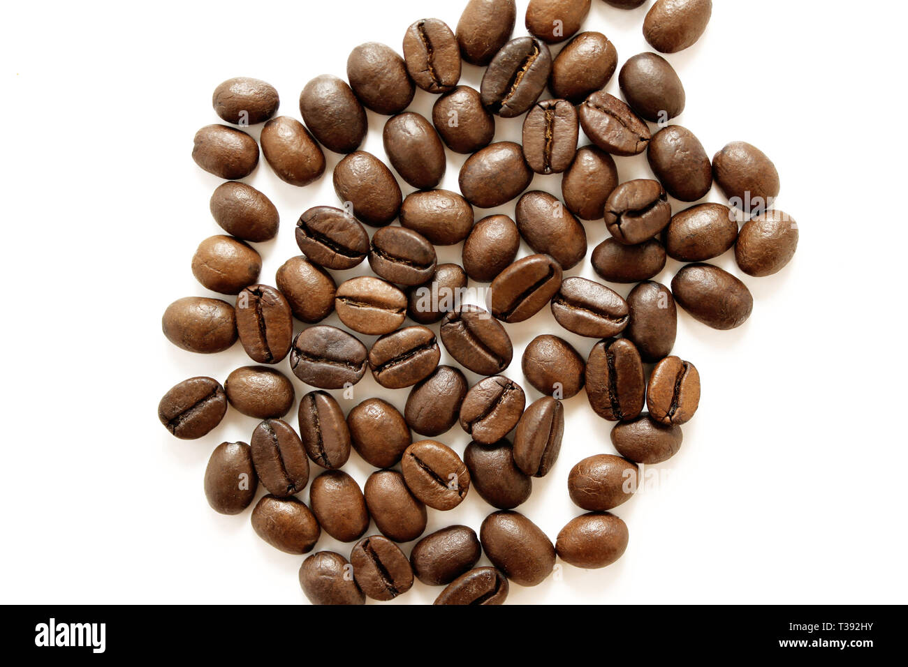Coffee grains on white background Stock Photo - Alamy