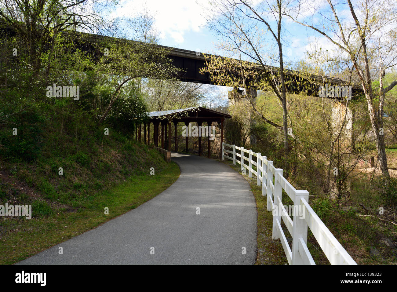 The Neuse River hiking and biking trail as it passes below a set of ...