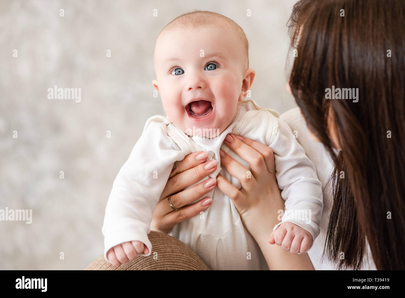 Maternal hands hi-res stock photography and images - Alamy