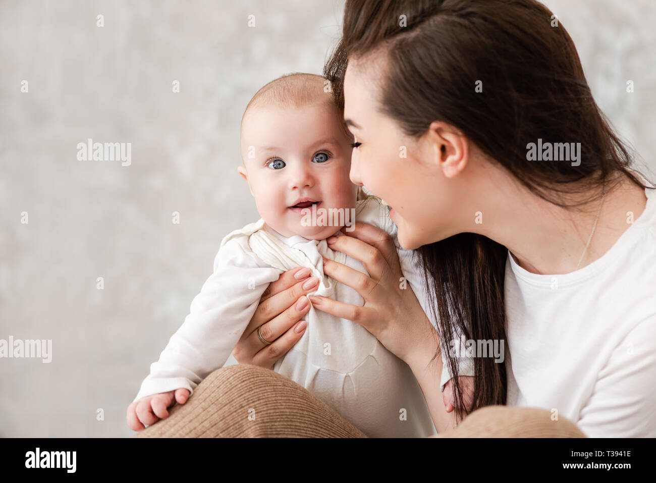Maternal arms hi-res stock photography and images - Alamy