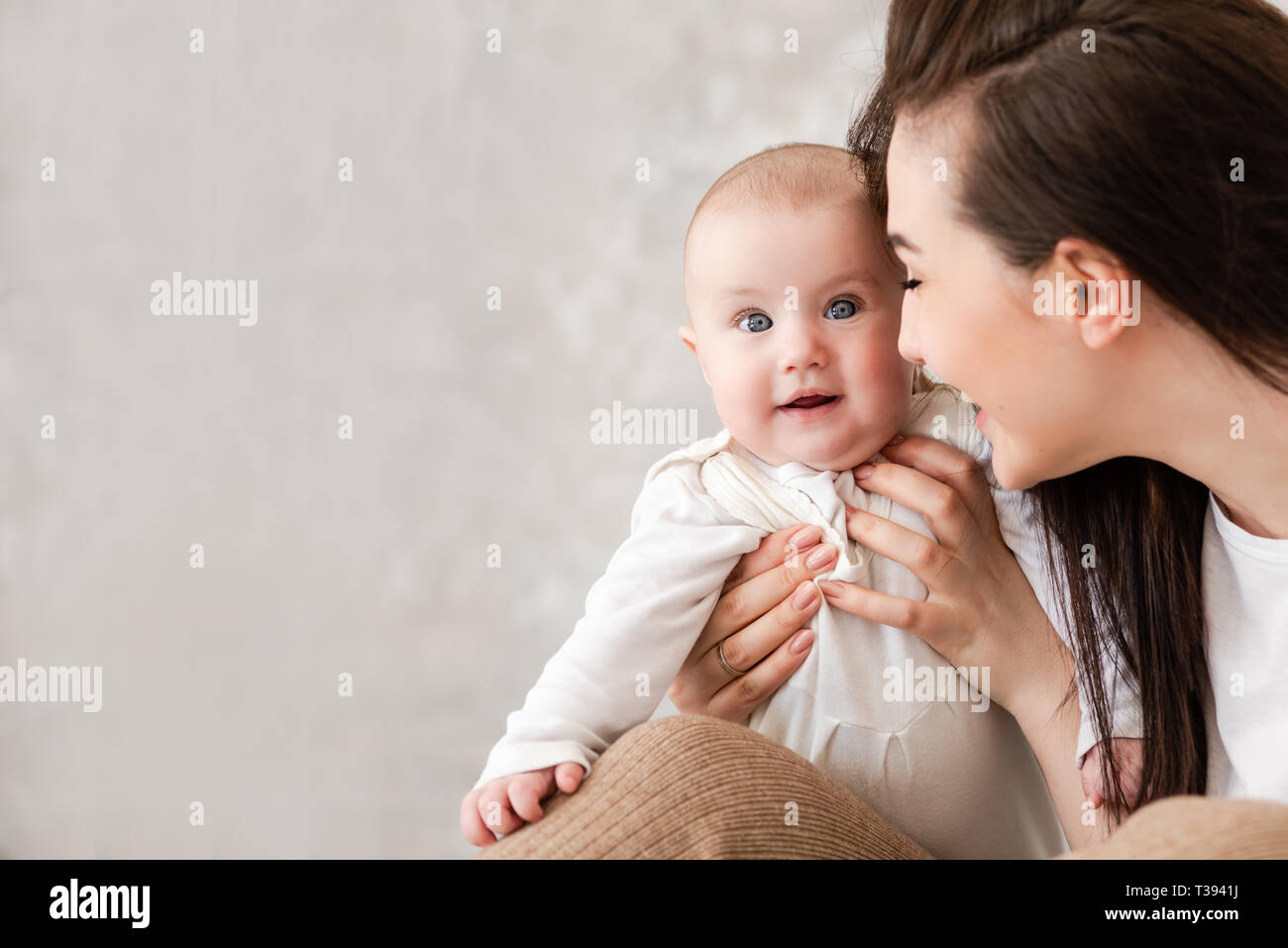 Maternal arms hi-res stock photography and images - Alamy