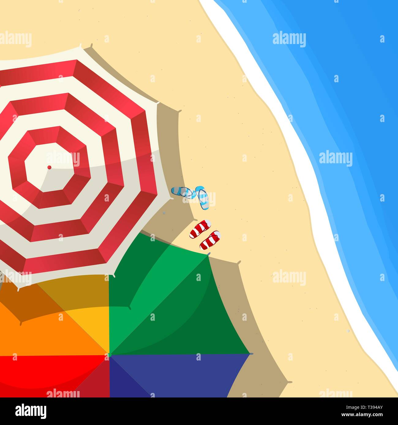 Summer day at the beach composition with umbrellas and slippers, aerial ...