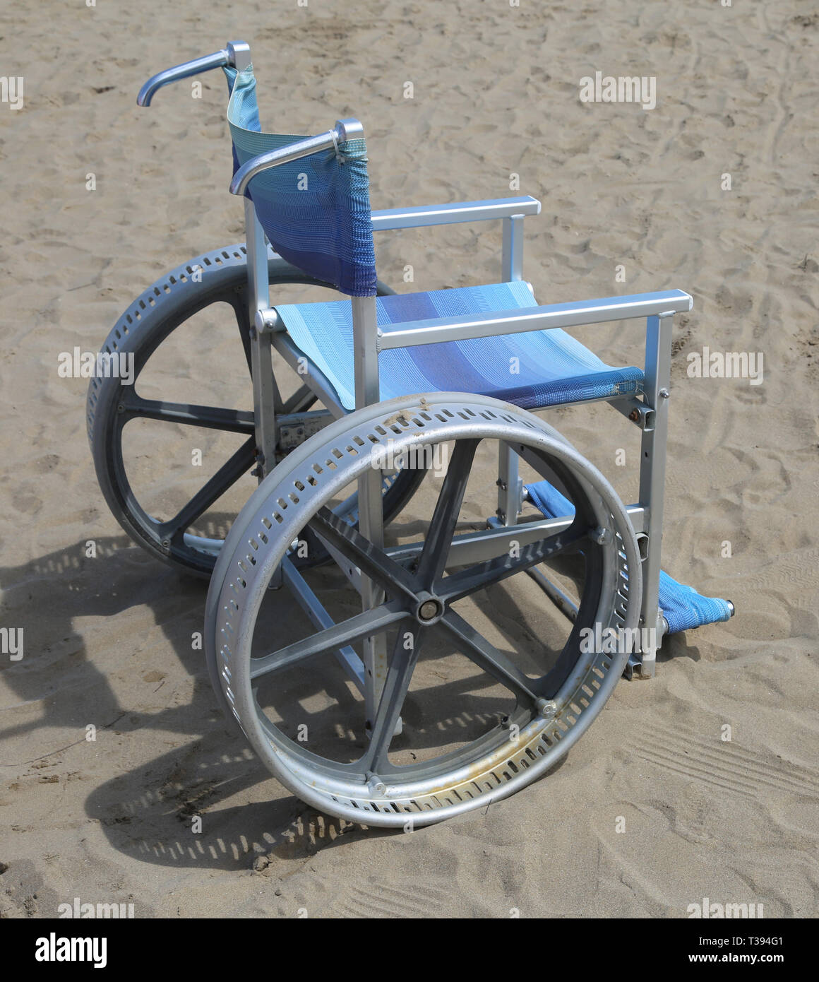 special wheel chair to move on the sand without people Stock Photo - Alamy