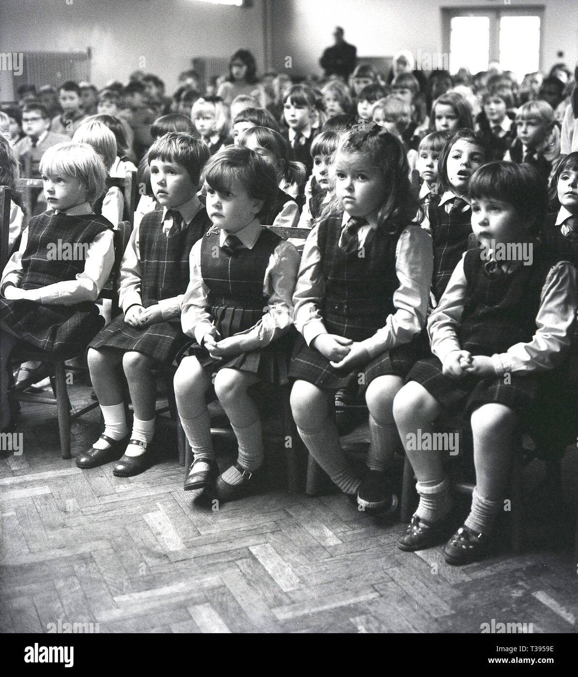 1960s, historica, school children sitting for assembly, England, UK ...