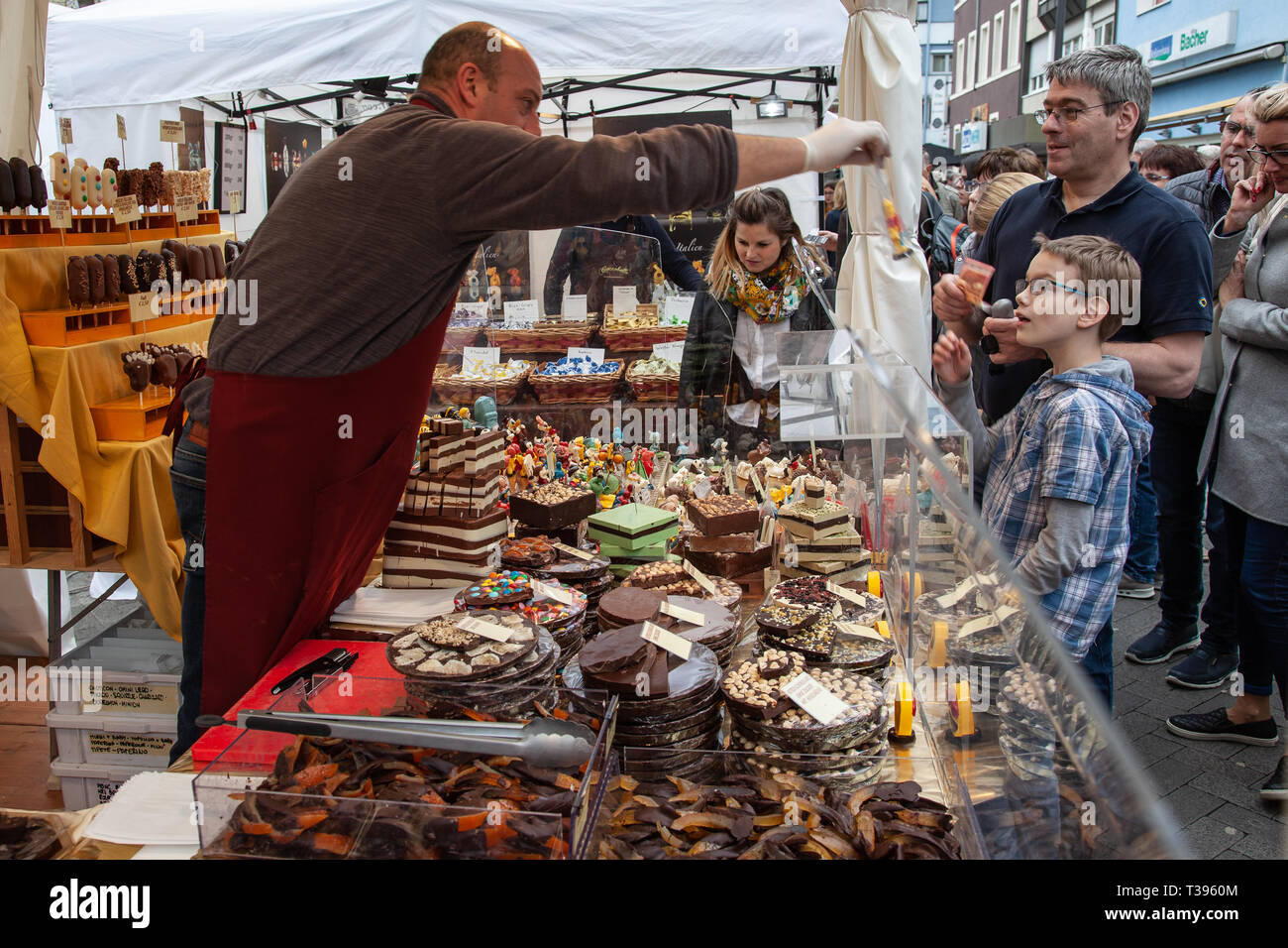 Neuwied, Germany - April 6, 2019: an italian salesman is selling sweets ...