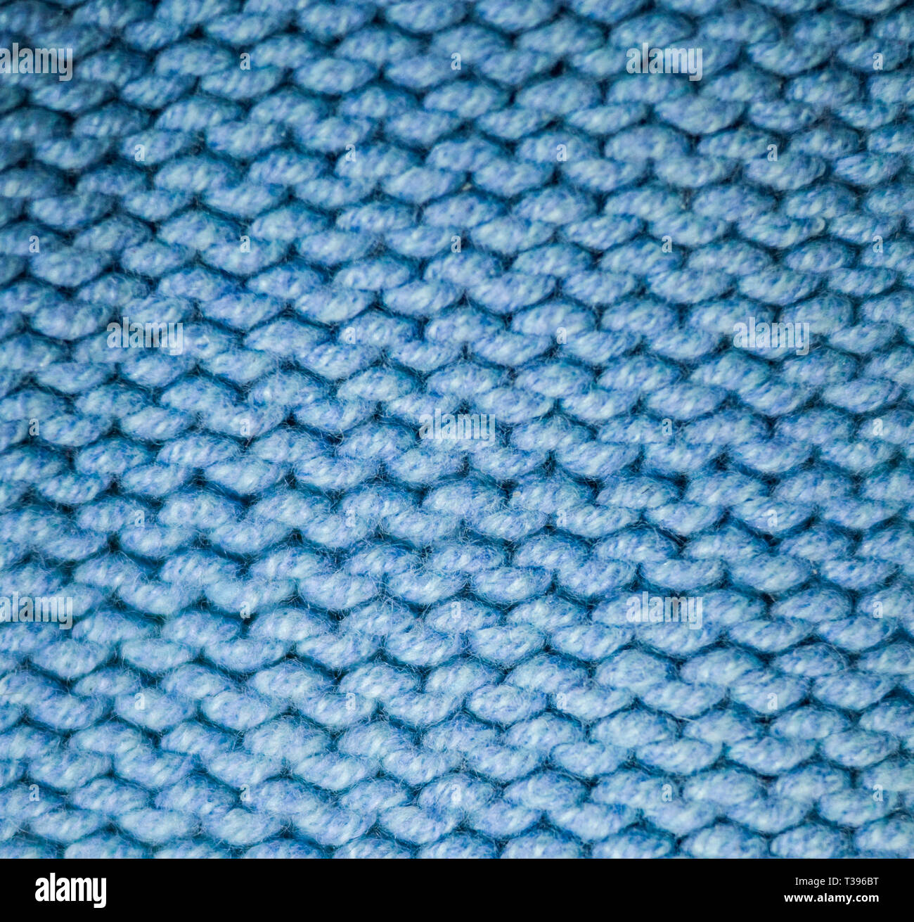 blue fabric woolen yarn texture. background, craftsmanship Stock Photo ...