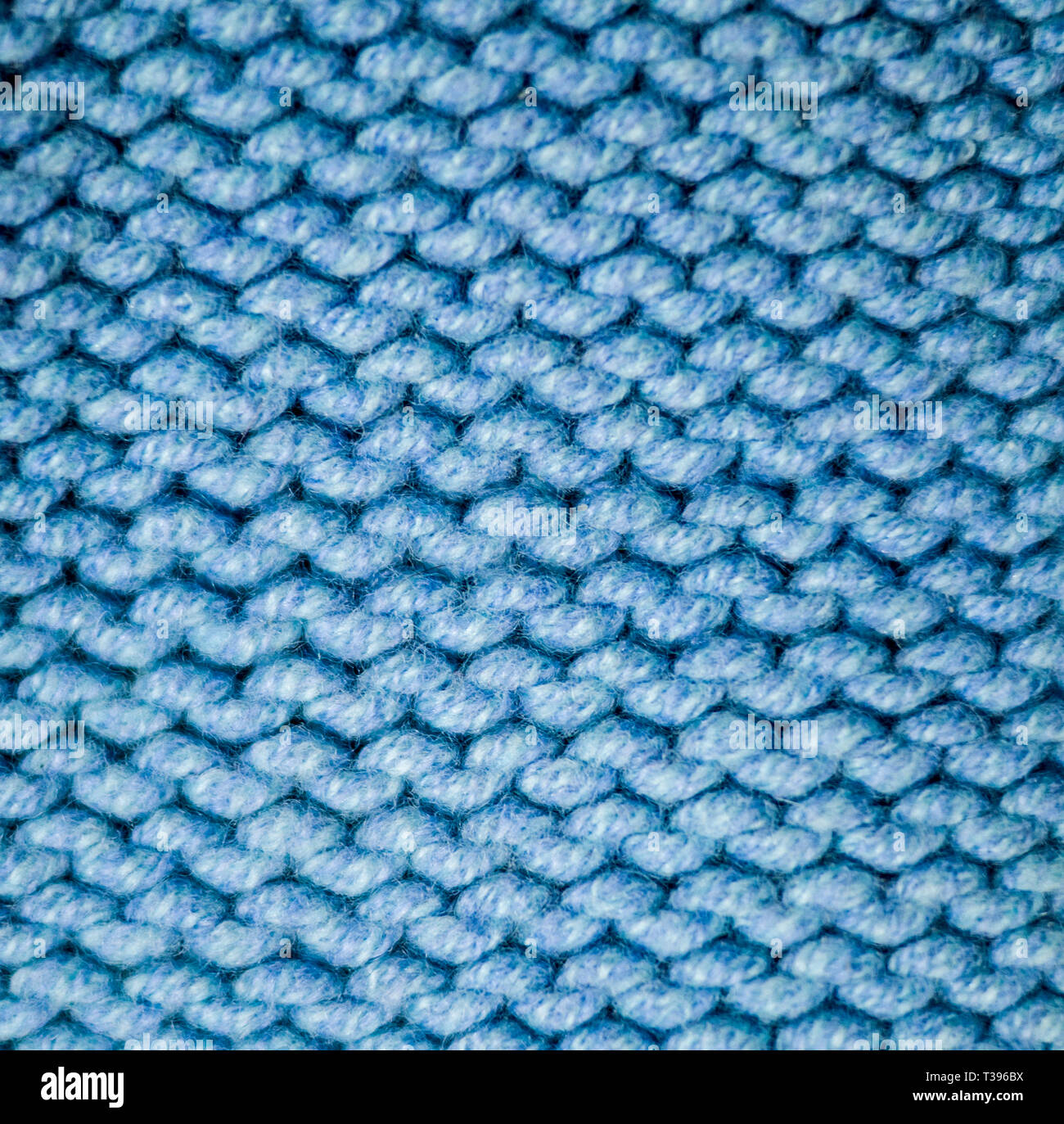 blue fabric woolen yarn texture. background, craftsmanship Stock Photo ...