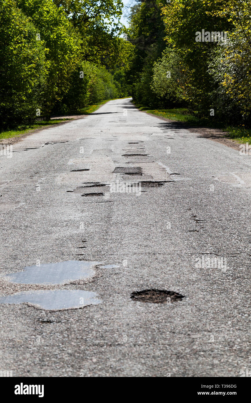 Patched asphalt road hi-res stock photography and images - Alamy