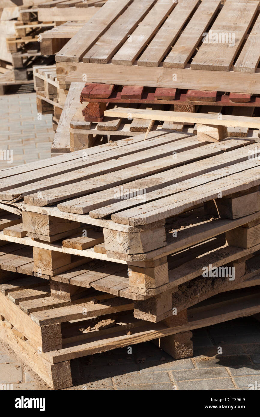 Scattered on construction sites wooden Boxes for storage and ...