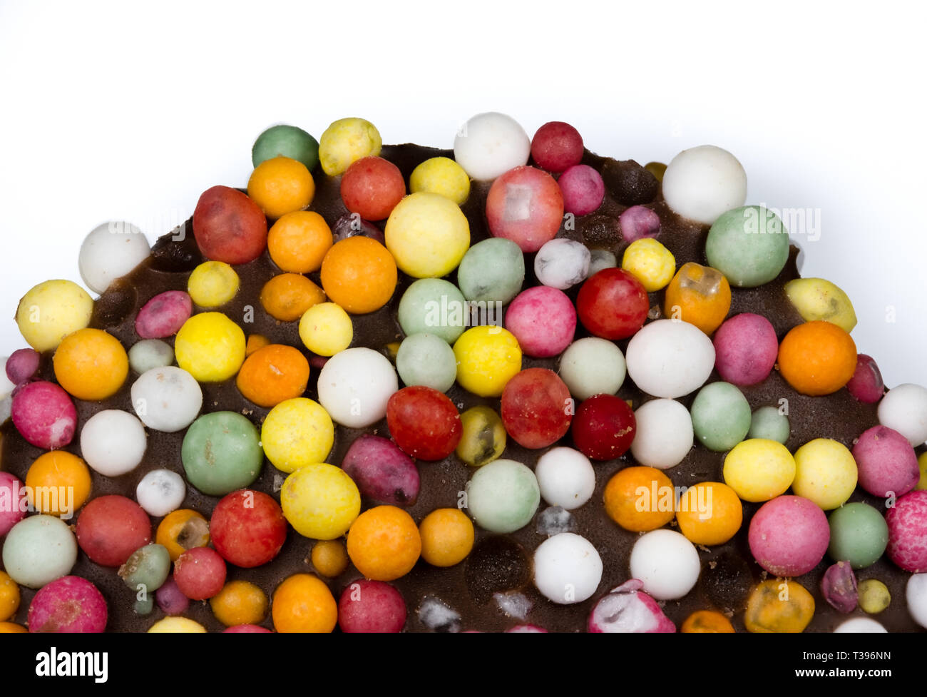 Macro image of a 'freckle', chocolate bud coated in sprinkles, isolated ...