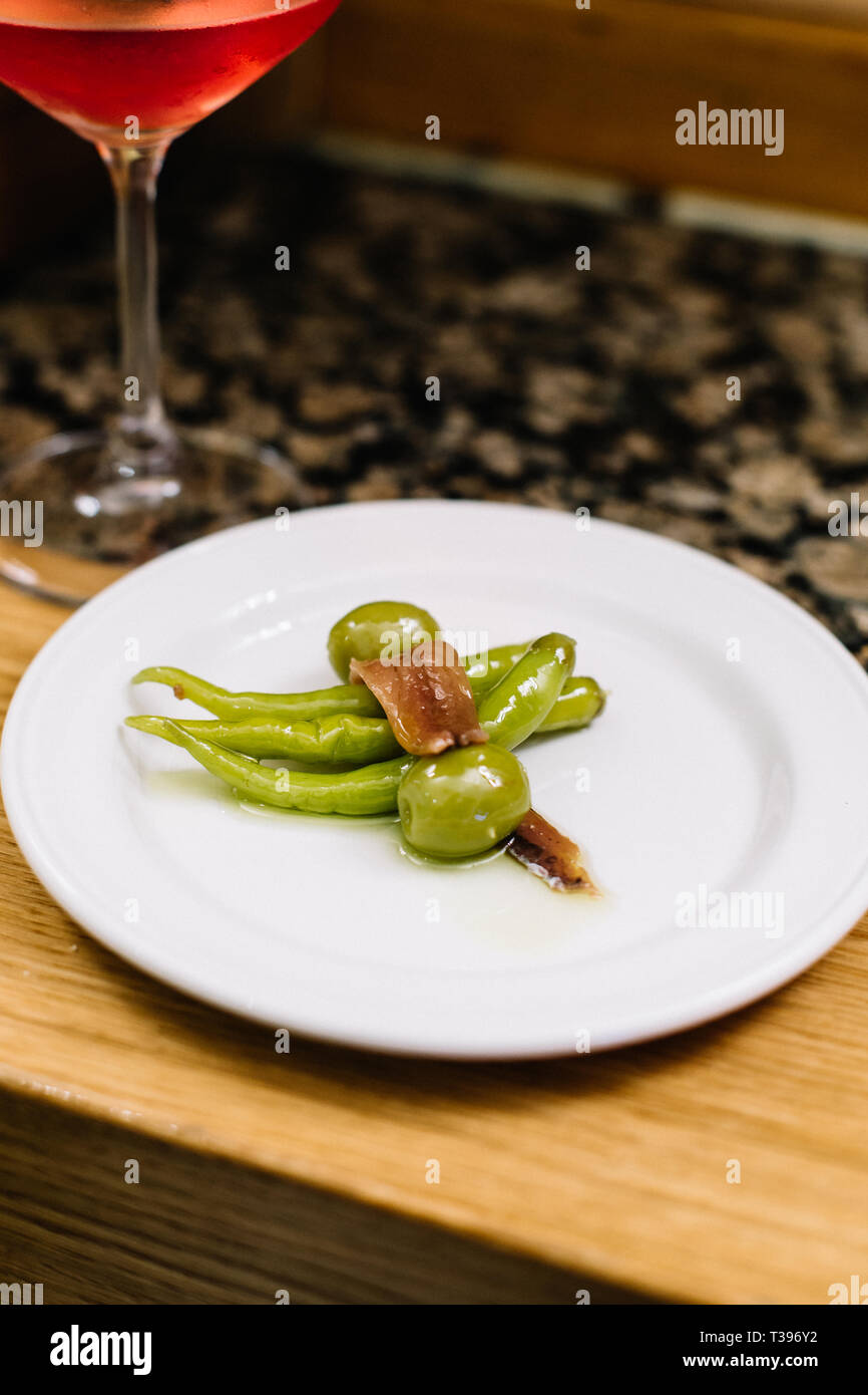 Traditional Basque dish, Gilda Pintxos, served at a bar in San ...