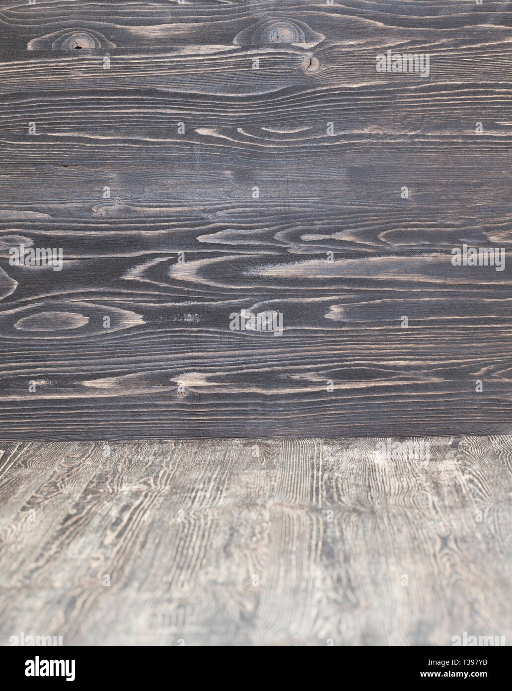 painted in black paint and shabby wooden surface as a background for ...