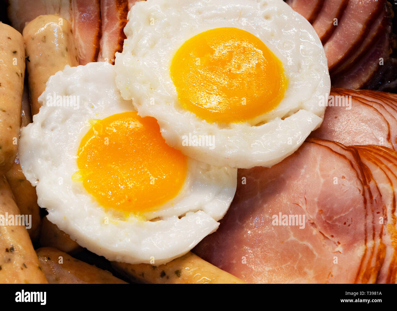 Breakfast with Bacon and eggs, ham, sausage Stock Photo - Alamy