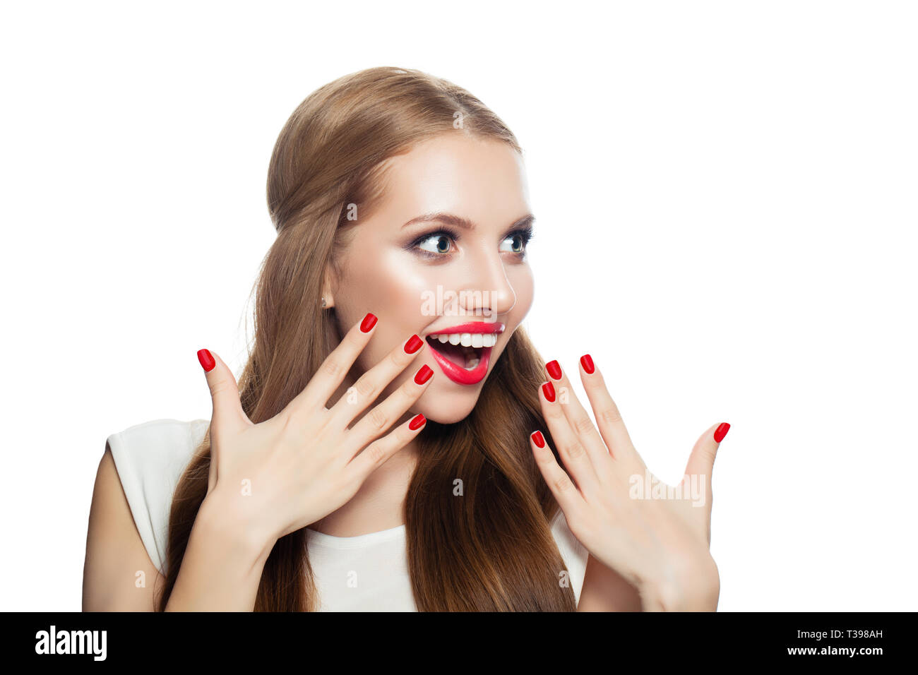Young surprised woman isolated on white background. Laughing girl with ...