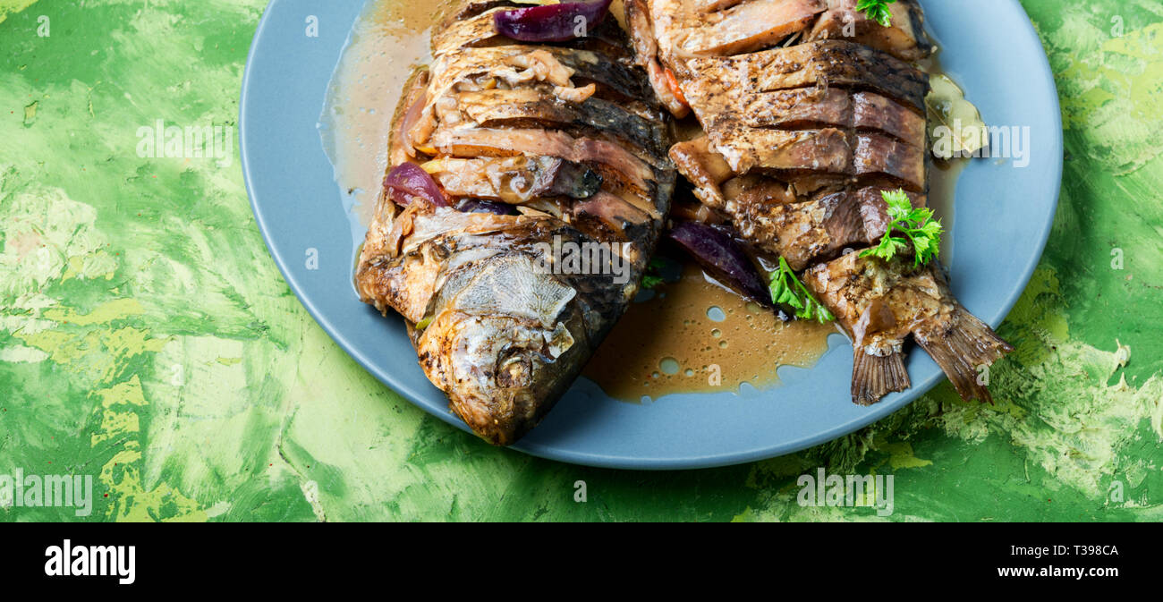 Grilled fish and spicy seafood sauce.Grilled fish with spices Stock ...