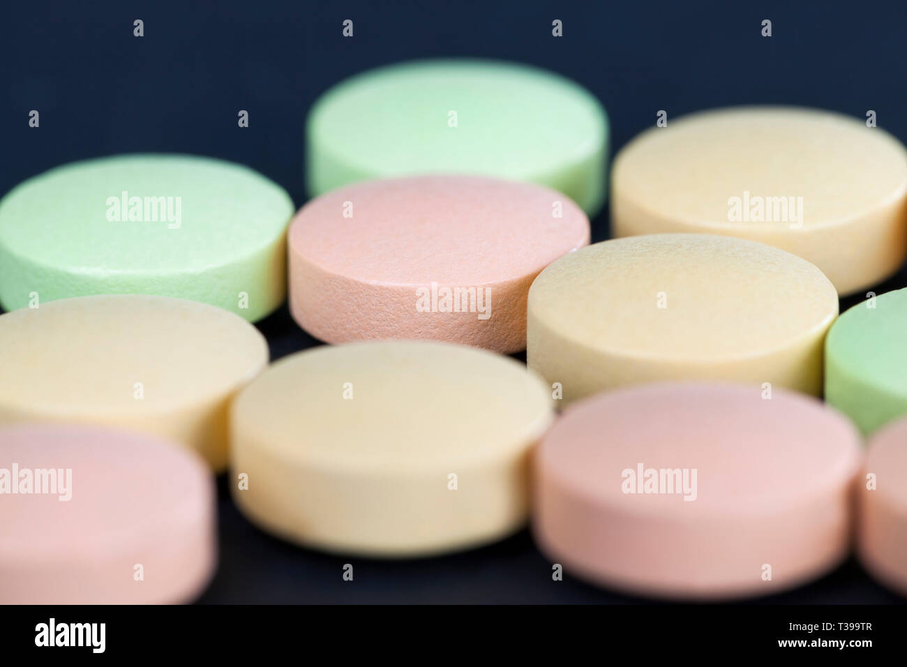 Multi-colored tablets of the same form for admission at different times ...