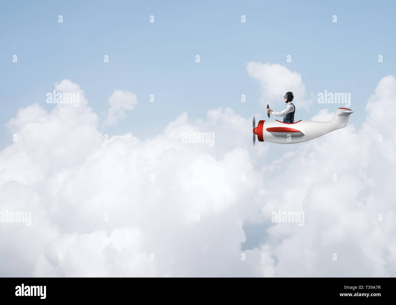 Man in aviator hat with goggles driving propeller plane. Funny man ...